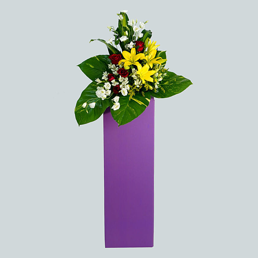 Magnificent Mixed Flowers Purple Cardboard Stand Delivery in Singapore ...