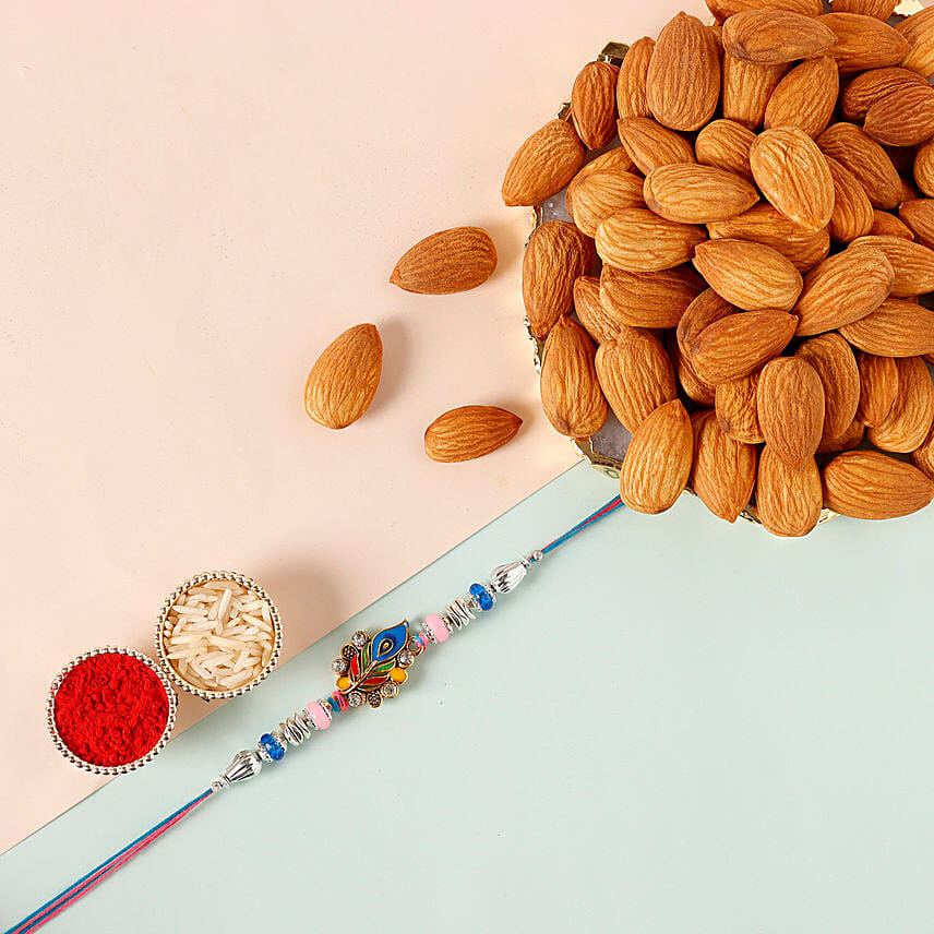 Sneh Designer Peacock Rakhi And Almonds Delivery In Singapore Fnp Sg