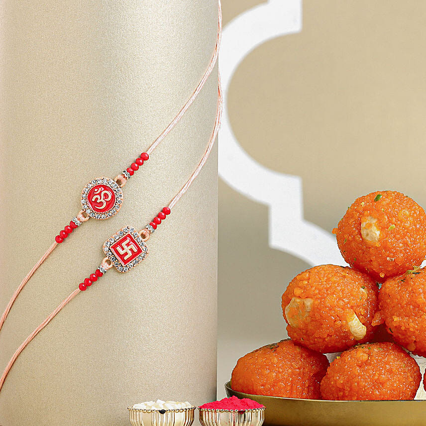 Ethereal Om Swastik Pair Rakhi N Motichoor Laddoo Delivery in Singapore ...