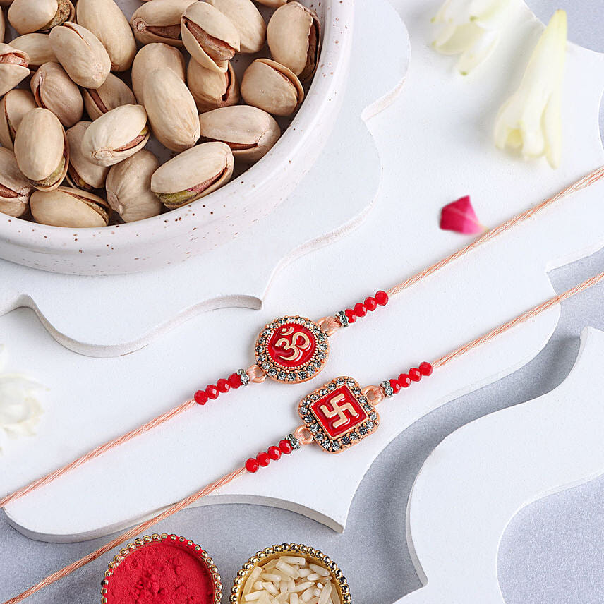 Ethereal Om Swastik Pair Rakhi N Pistachio Delight Delivery in ...