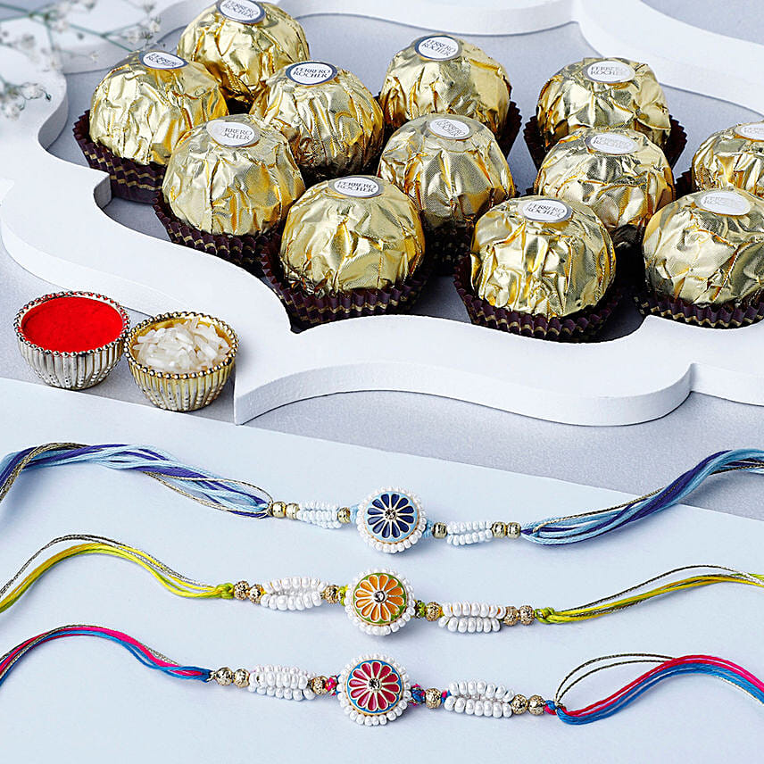 Floral Heritage Round Rakhi N Ferrero Indulgence Pack Delivery in ...