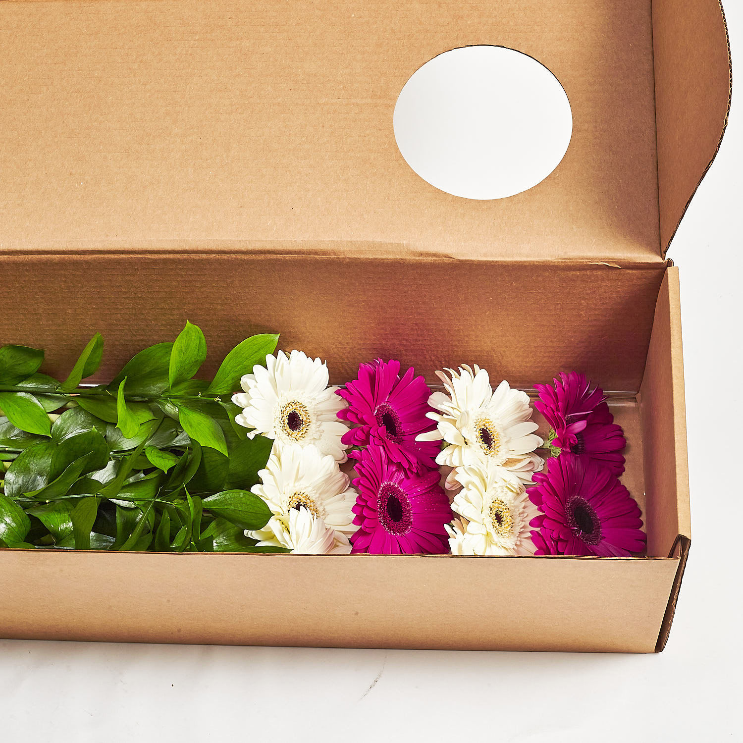 Ravishing Mixed Gerberas Box Delivery in Singapore - FNP SG