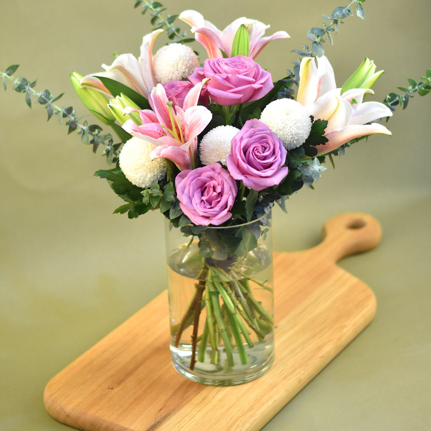 Gracious Mixed Flowers Cylindrical Vase Delivery in Singapore - FNP SG