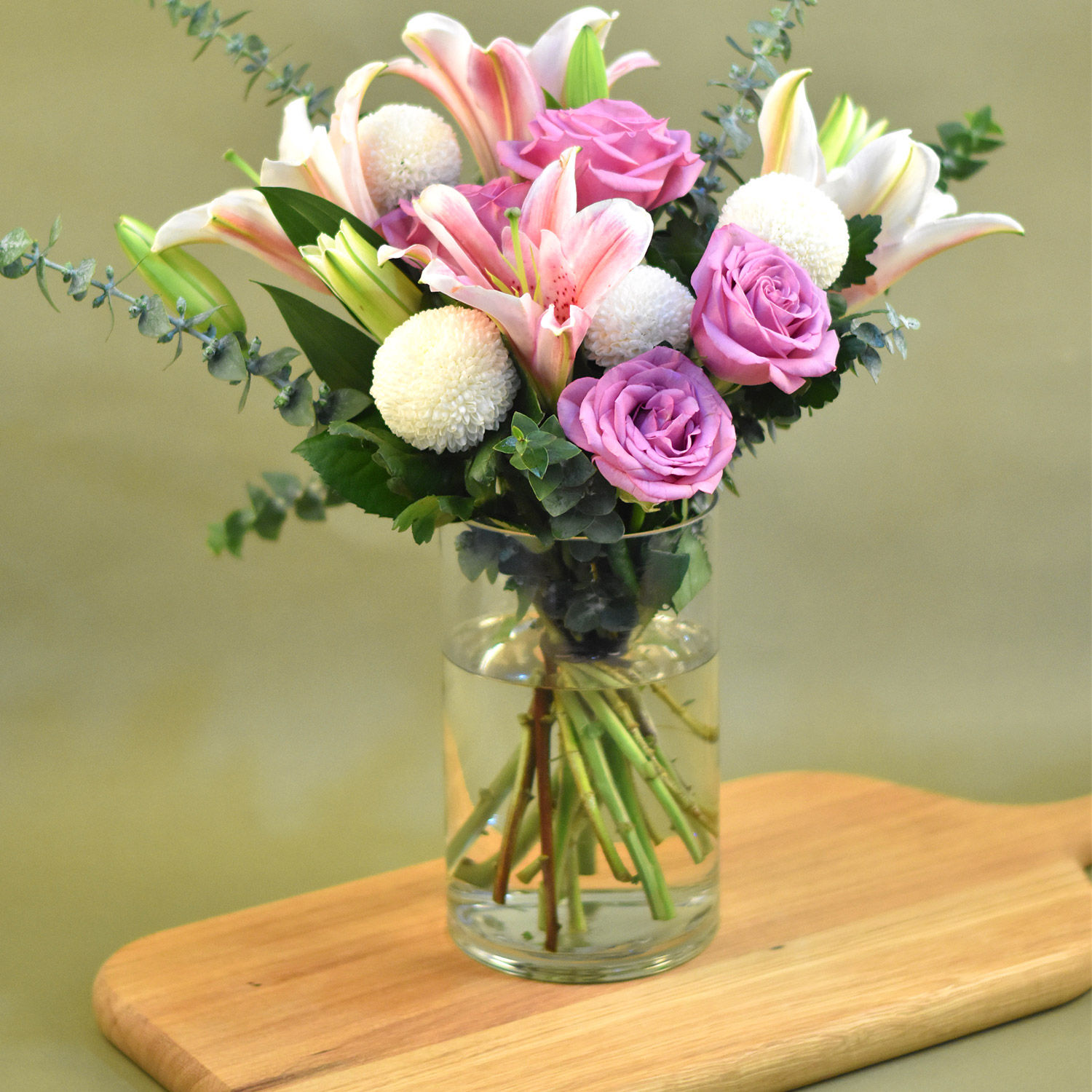 Gracious Mixed Flowers Cylindrical Vase Delivery in Singapore - FNP SG