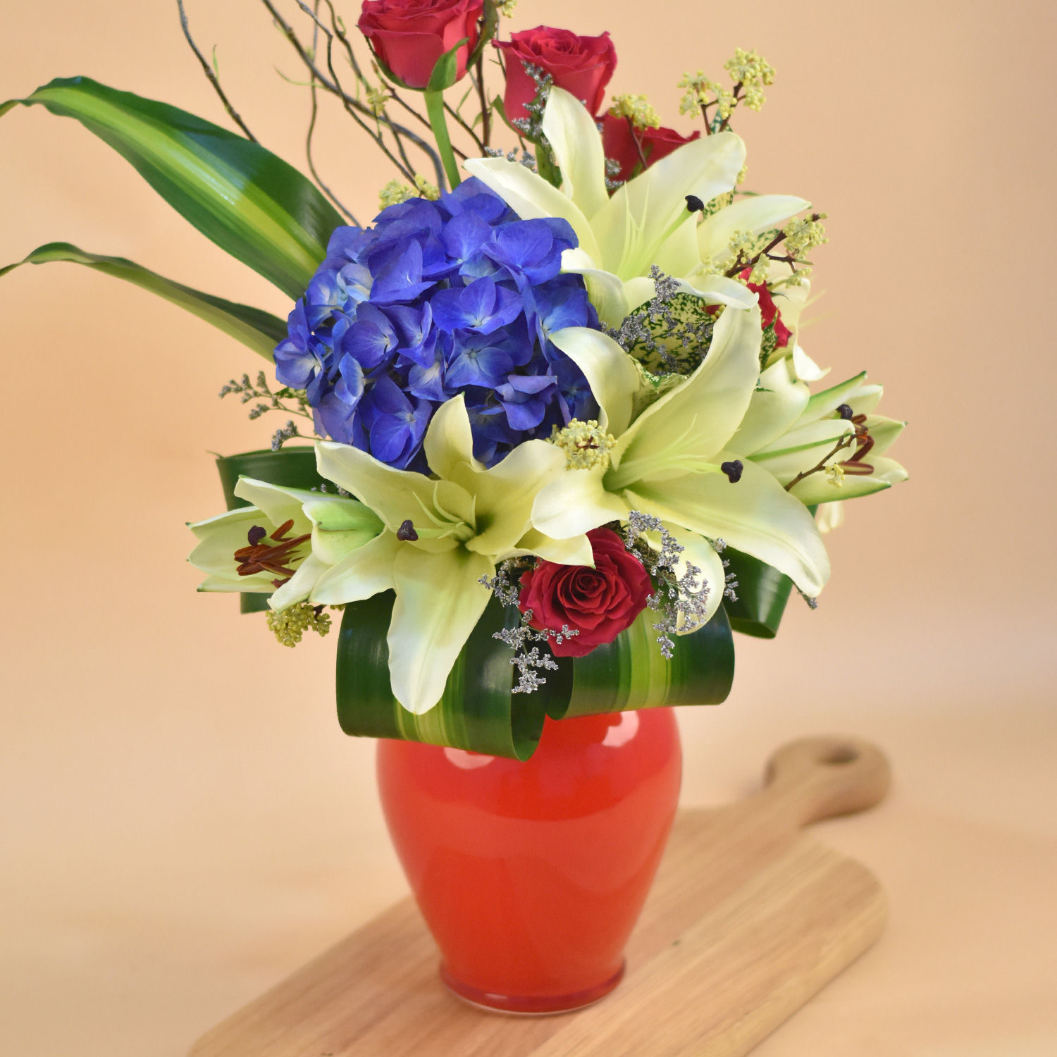 Charismatic Flowers Red Vase Delivery in Singapore - FNP SG