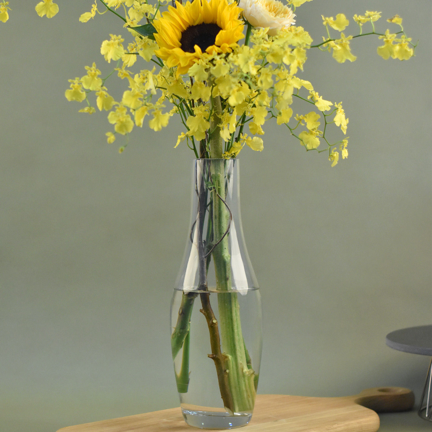Gleaming Flowers Bottle Vase Delivery in Singapore - FNP SG