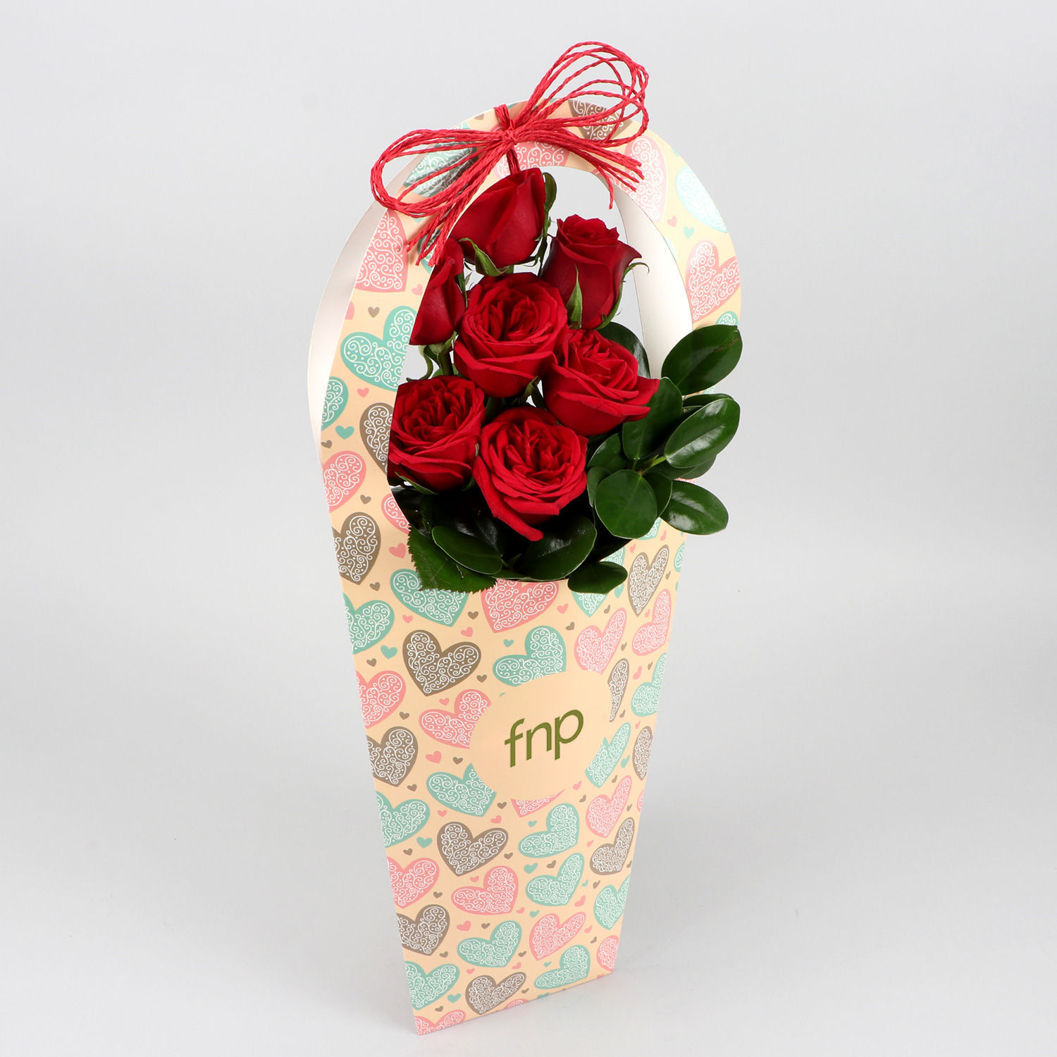 Red Roses In FNP Heart Sleeve Delivery in Singapore - FNP SG