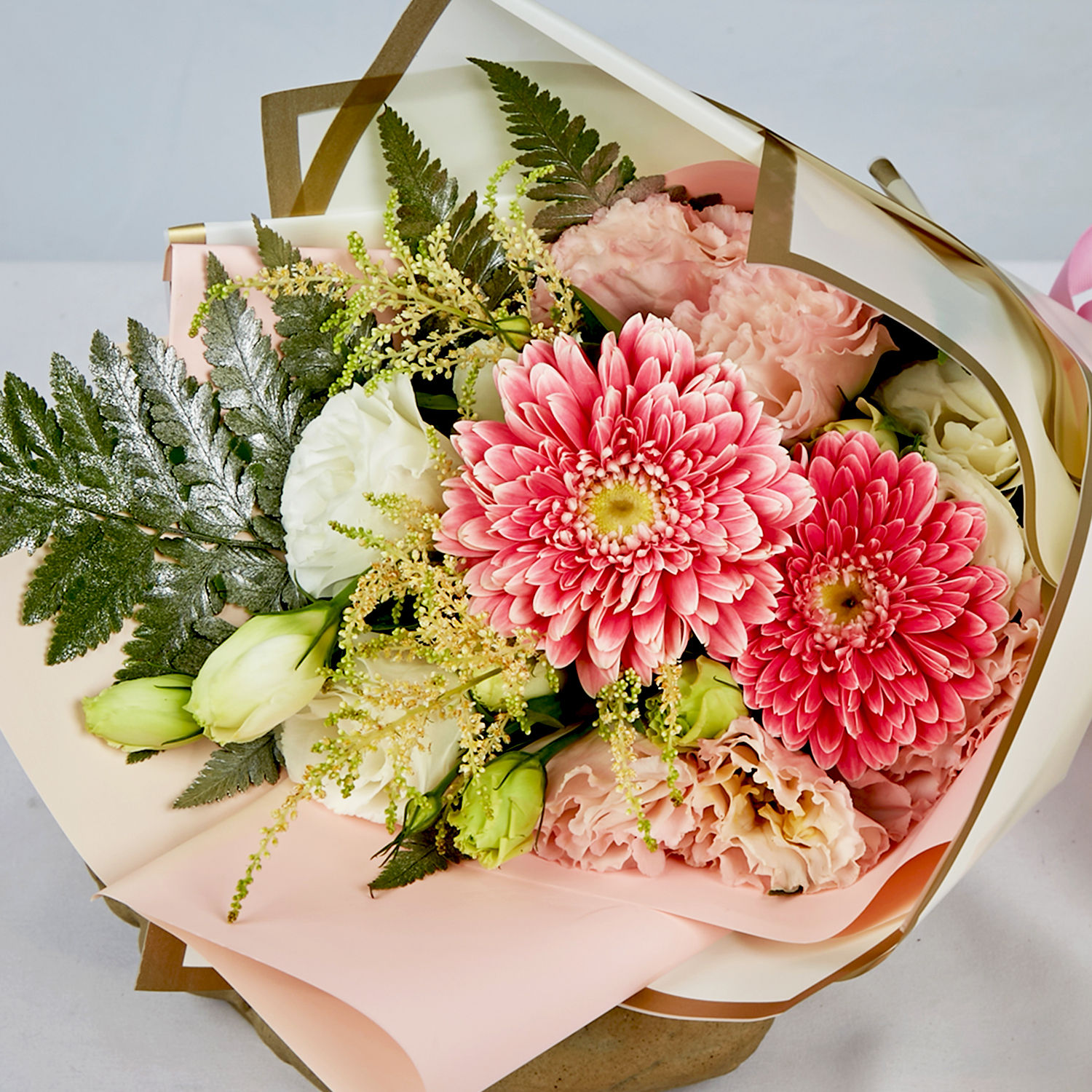 Dignified Mixed Flowers Hand Bouquet Delivery in Singapore - FNP SG