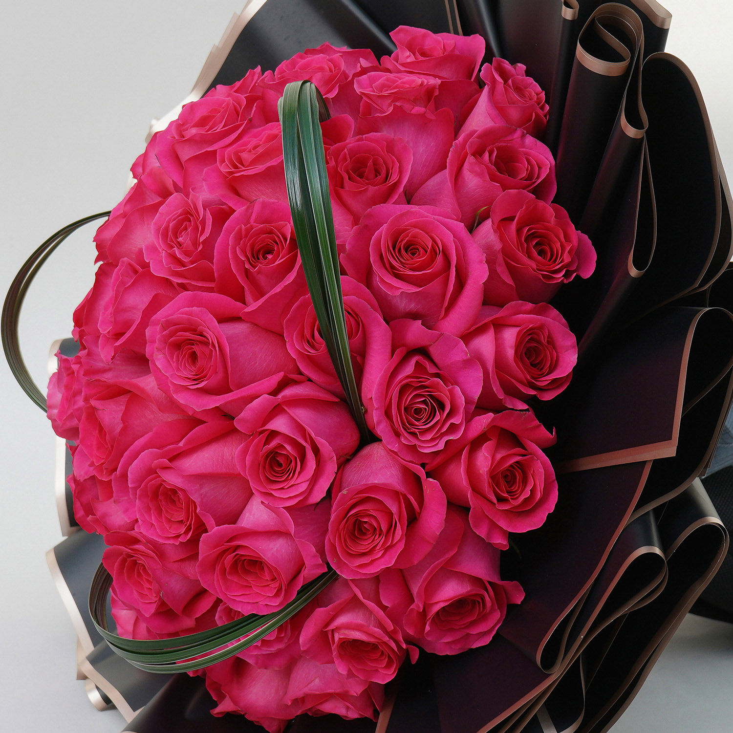 50 Dark Pink Roses Bouquet Delivery in Singapore - FNP SG