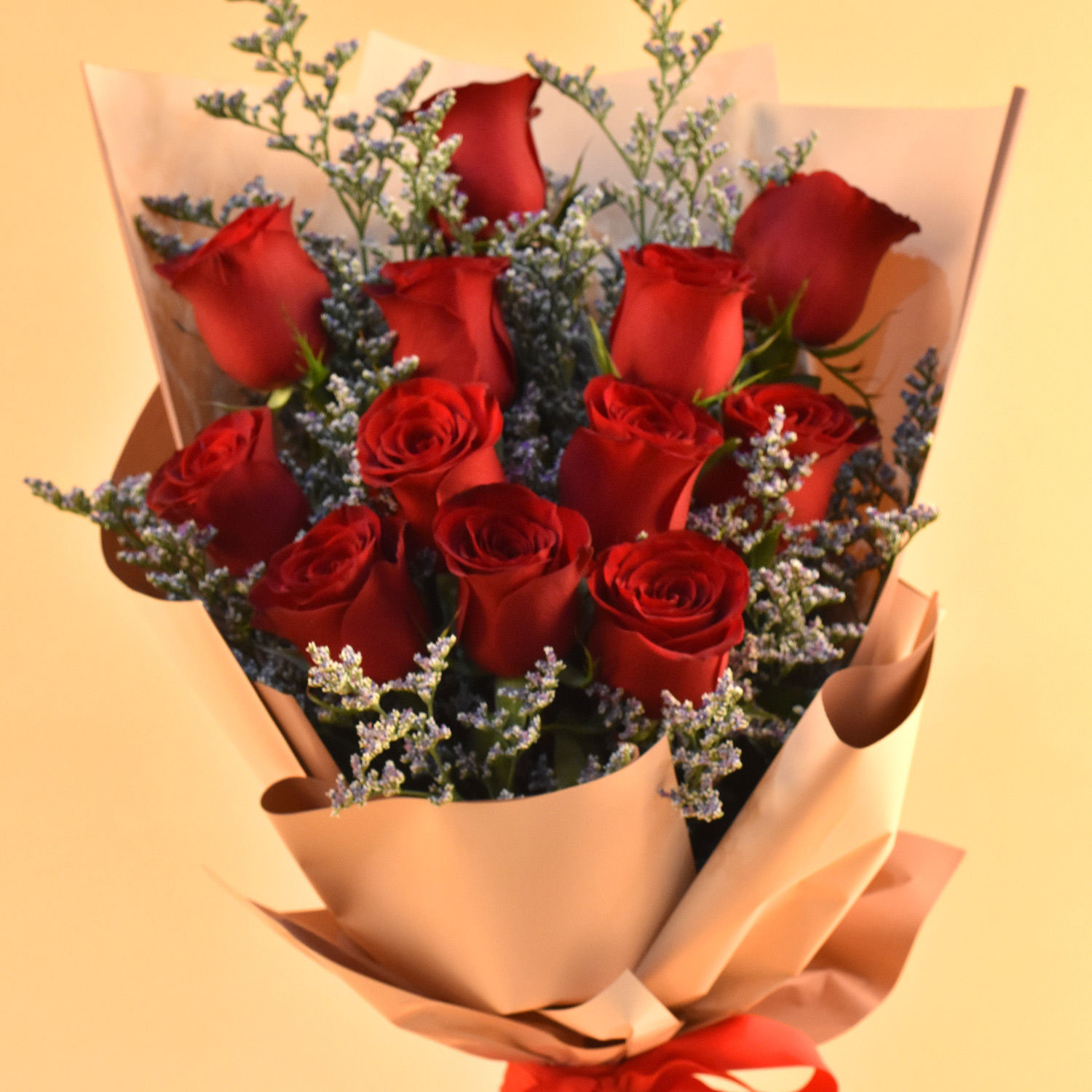Red Roses & Limonium Beautifully Tied Hand Bouquet Delivery in ...