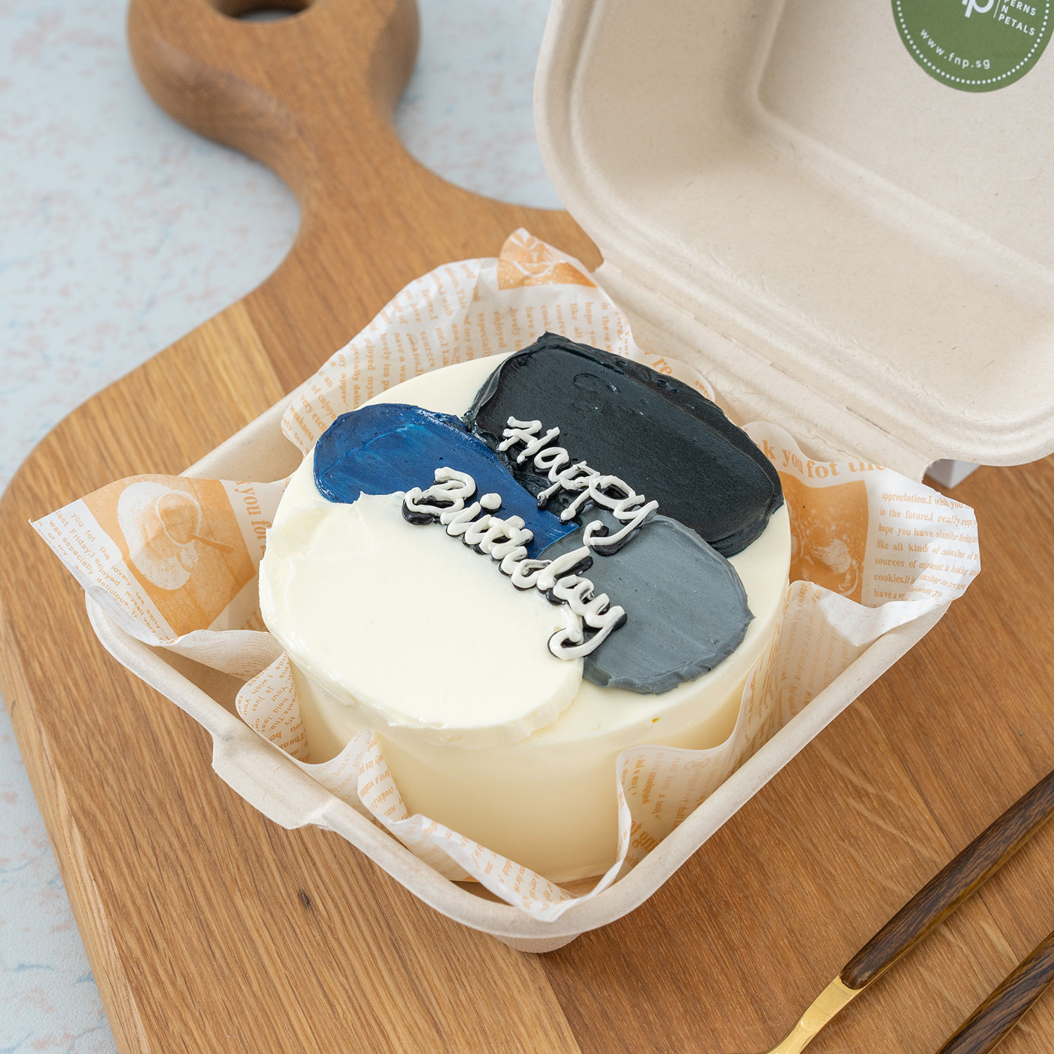 Abstract Navy Blue Bento Nutella Cake Delivery in Singapore - FNP SG