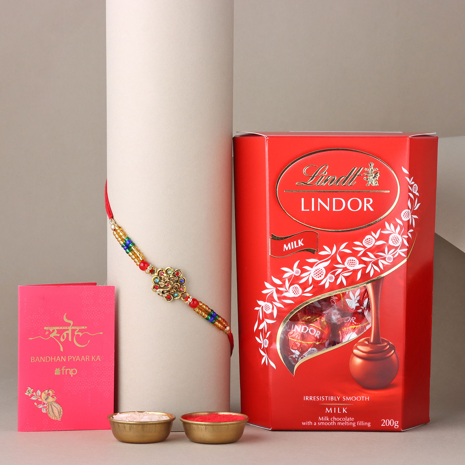 Sneh Designer Peacock Rakhi with Lindt Lindor Chocolate Box Delivery in ...