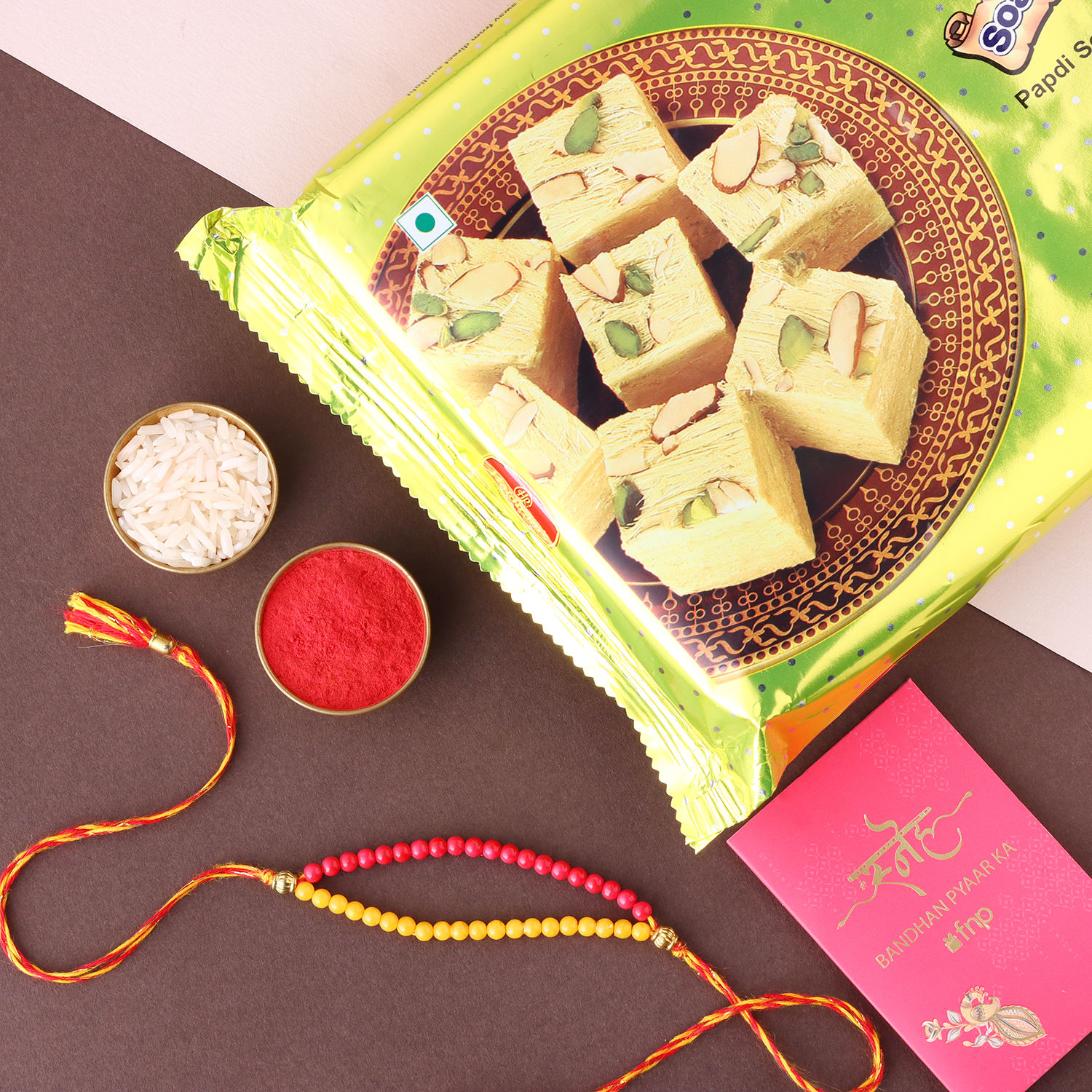 Sneh Red and Yellow Bead Rakhi with Soan Papdi Delivery in Singapore ...