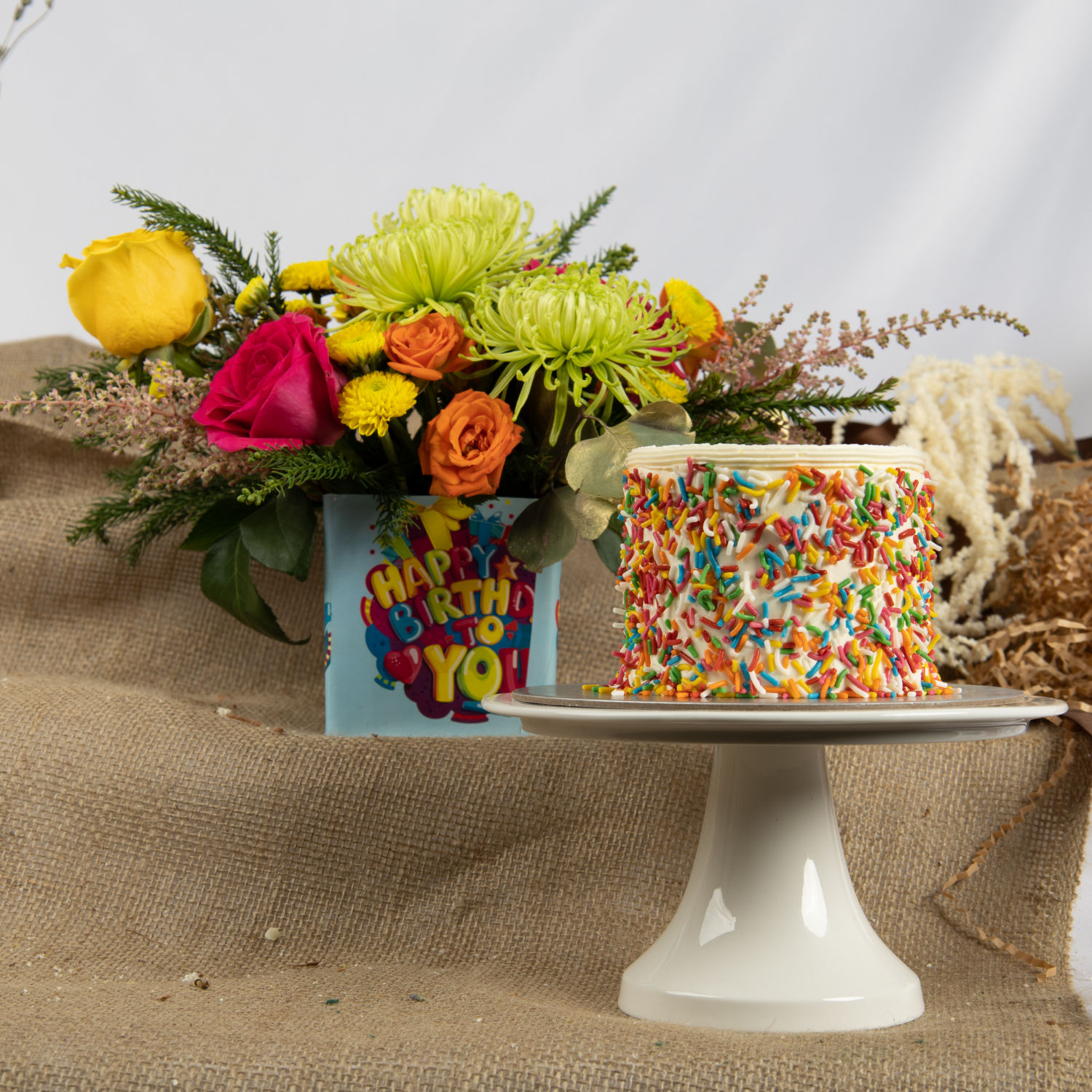 Estatic Birthday Flowers Vase With Cake Delivery in Singapore - FNP SG