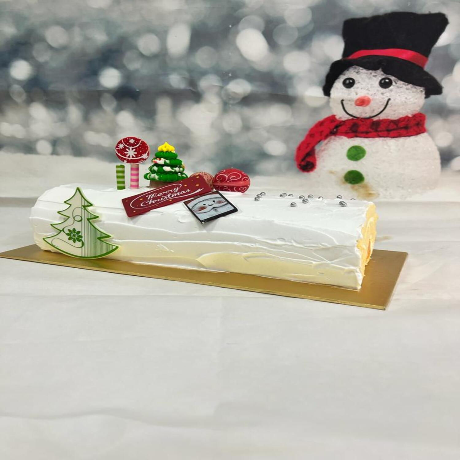 Xmas Mango Tango Log Cake Delivery in Singapore - FNP SG