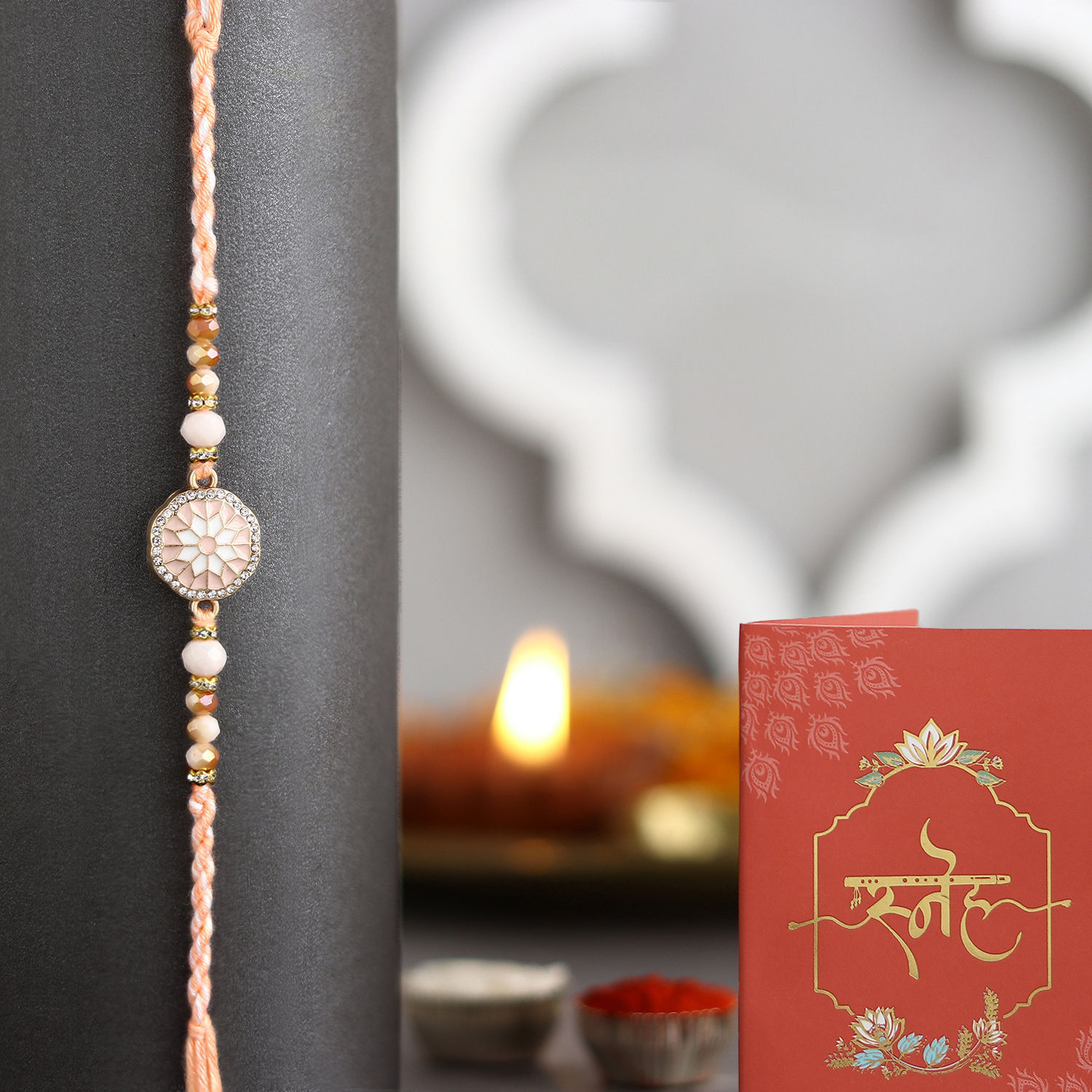 Rosy American Diamond Rakhi Delivery in Singapore - FNP SG