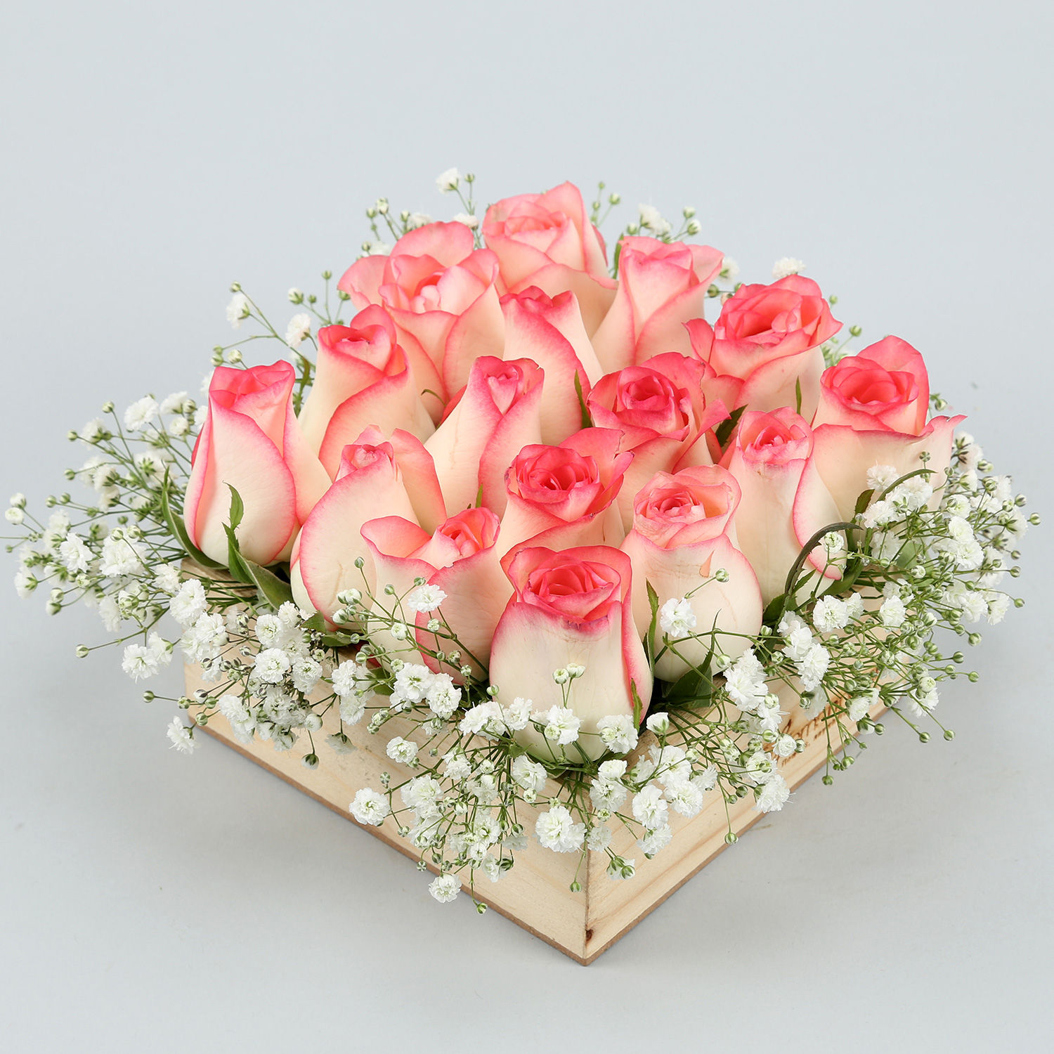 16 Pink Roses Arrangement In Wooden Base Delivery in Singapore - FNP SG