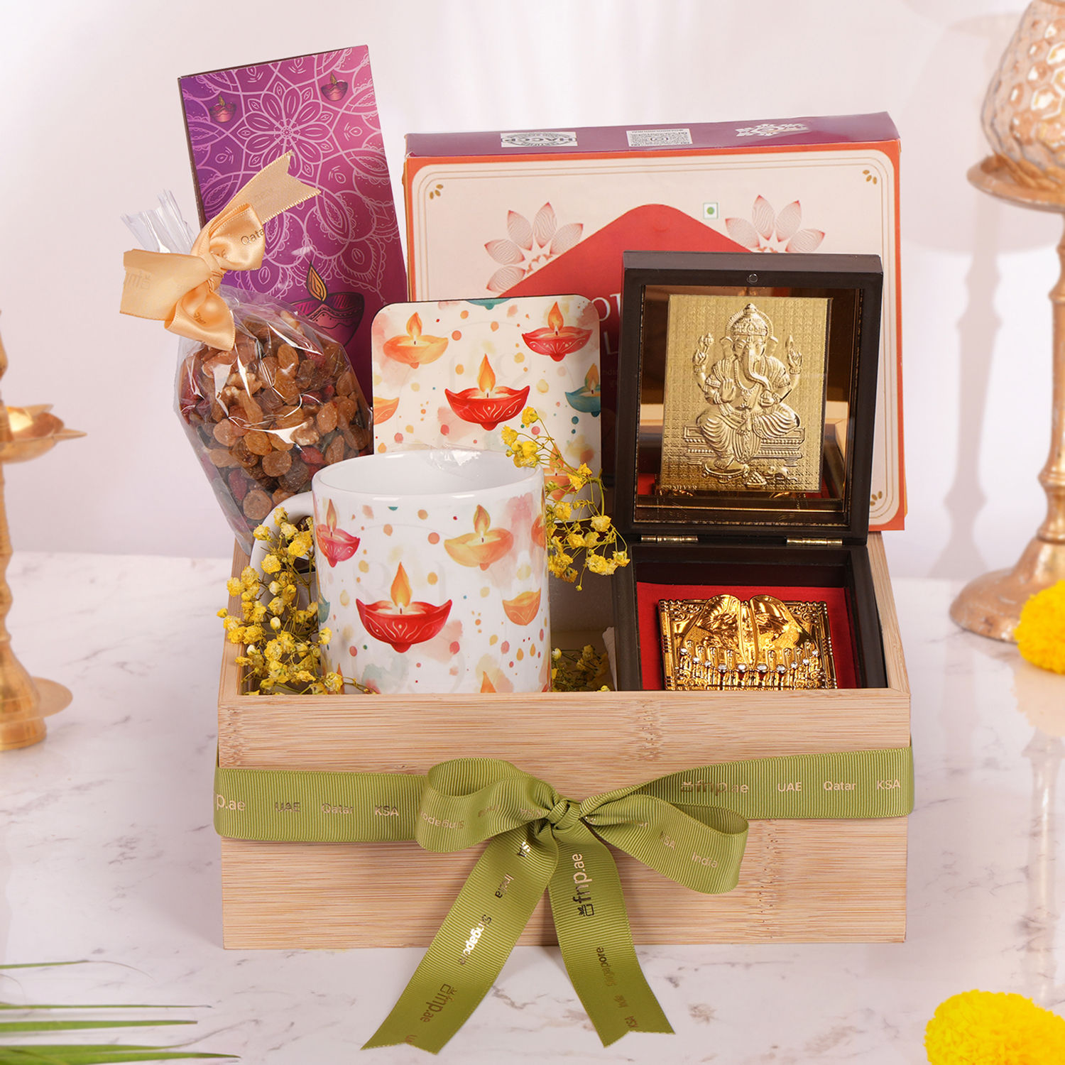 Divine Ganesha Gift Hamper with Sweets, Dry Fruits Delivery in ...